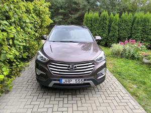 Brūns Hyundai Grand Santa Fe 2015 Viļņa, ar dzinēja tilpumu 2.20 L un nobraukumu 182 tūkst. km par 11500 €, foto  vietnē AUTOMOTO.COM.LV