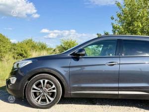 Hyundai Grand Santa Fe 2014 in Siauliai, with an engine capacity of 2.20 L and mileage of 220 thousand km for 15750 €, photo 12 on AUTOMOTO.COM.LV