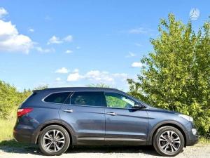Hyundai Grand Santa Fe 2014 in Siauliai, with an engine capacity of 2.20 L and mileage of 220 thousand km for 15750 €, photo 15 on AUTOMOTO.COM.LV