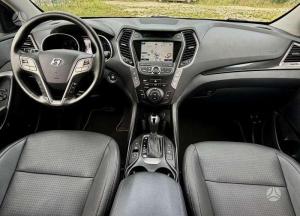Pelēks Hyundai Grand Santa Fe 2015 Šauļi, ar dzinēja tilpumu 2.20 L un nobraukumu 257 tūkst. km par 15450 €, foto 25 vietnē AUTOMOTO.COM.LV