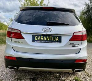 Pelēks Hyundai Grand Santa Fe 2015 Šauļi, ar dzinēja tilpumu 2.20 L un nobraukumu 257 tūkst. km par 15450 €, foto 7 vietnē AUTOMOTO.COM.LV