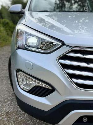Pelēks Hyundai Grand Santa Fe 2015 Šauļi, ar dzinēja tilpumu 2.20 L un nobraukumu 257 tūkst. km par 15450 €, foto 18 vietnē AUTOMOTO.COM.LV