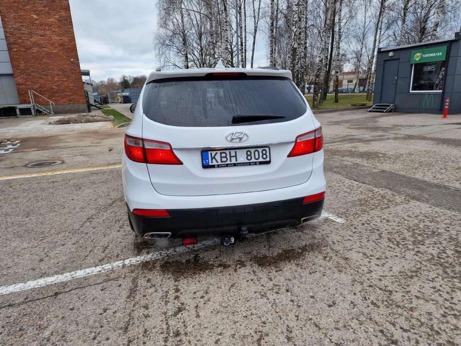 Balts Hyundai Grand Santa Fe 2014 Marijampole, ar dzinēja tilpumu 3.30 L un nobraukumu 140 tūkst. km par 10200 €, foto 4 vietnē AUTOMOTO.COM.LV