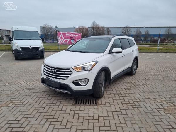 Balts Hyundai Grand Santa Fe 2015 Alīta, ar dzinēja tilpumu 3.30 L un nobraukumu 84 tūkst. km par 13150 €, foto 1 vietnē AUTOMOTO.COM.LV