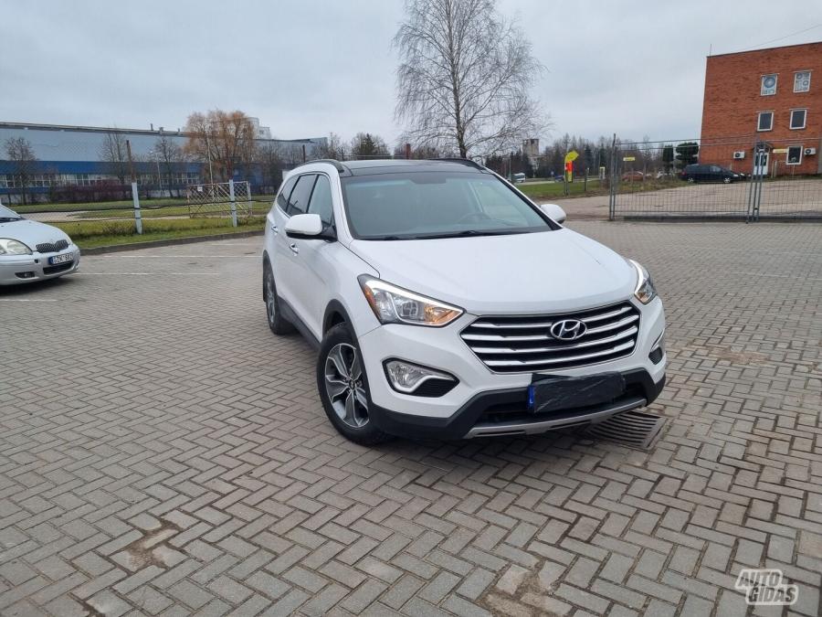 White Hyundai Grand Santa Fe 2015 in Alytus, with an engine capacity of 3.30 L and mileage of 84 thousand km for 13150 €, photo 3 on AUTOMOTO.COM.LV