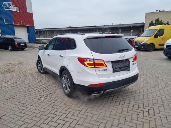 Balts Hyundai Grand Santa Fe 2015 Alīta, ar dzinēja tilpumu 3.30 L un nobraukumu 84 tūkst. km par 13150 €, foto 6 vietnē AUTOMOTO.COM.LV