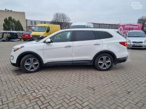 White Hyundai Grand Santa Fe 2015 in Alytus, with an engine capacity of 3.30 L and mileage of 84 thousand km for 13150 €, photo 9 on AUTOMOTO.COM.LV