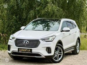 White Hyundai Grand Santa Fe 2017 in Siauliai, with an engine capacity of 2.20 L and mileage of 232 thousand km for 17999 €, photo  on AUTOMOTO.COM.LV