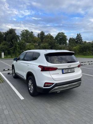 White Hyundai Grand Santa Fe 2019 in Kaunas, with an engine capacity of 2.40 L and mileage of 208 thousand km for 14500 €, photo 5 on AUTOMOTO.COM.LV