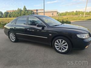 Melns Hyundai Grandeur 2010 Daugavpils, ar dzinēja tilpumu 2.20 L un nobraukumu 292 tūkst. km par 3400 €, foto 7 vietnē AUTOMOTO.COM.LV