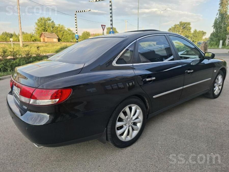 Melns Hyundai Grandeur 2010 Daugavpils, ar dzinēja tilpumu 2.20 L un nobraukumu 292 tūkst. km par 3400 €, foto 11 vietnē AUTOMOTO.COM.LV