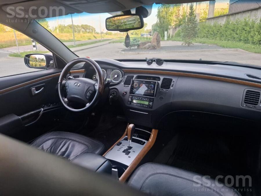 Melns Hyundai Grandeur 2010 Daugavpils, ar dzinēja tilpumu 2.20 L un nobraukumu 292 tūkst. km par 3400 €, foto 14 vietnē AUTOMOTO.COM.LV