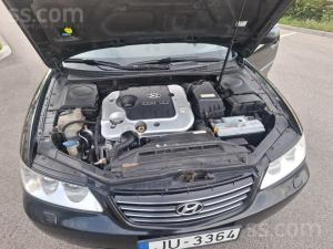 Melns Hyundai Grandeur 2010 Daugavpils, ar dzinēja tilpumu 2.20 L un nobraukumu 292 tūkst. km par 3400 €, foto 25 vietnē AUTOMOTO.COM.LV