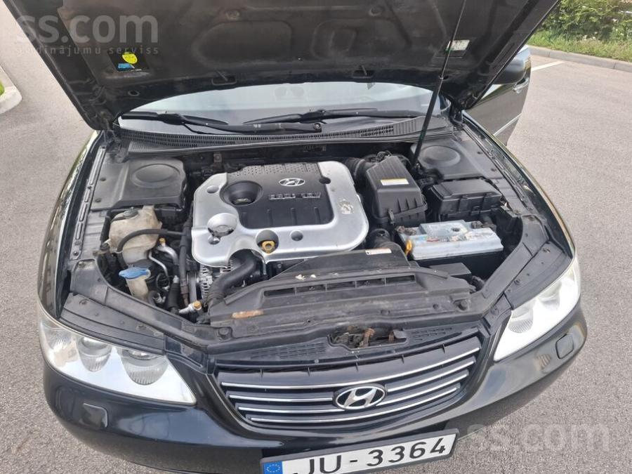 Melns Hyundai Grandeur 2010 Daugavpils, ar dzinēja tilpumu 2.20 L un nobraukumu 292 tūkst. km par 3400 €, foto 25 vietnē AUTOMOTO.COM.LV