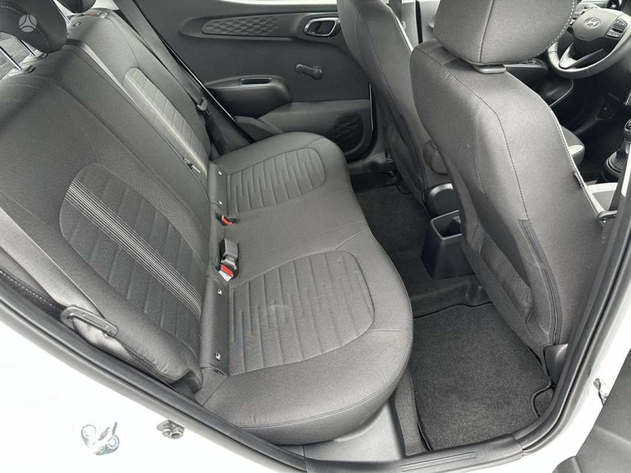 White Hyundai i10 2025 in Vilnius, with an engine capacity of 1.00 L and mileage of 1 thousand km for 13750 €, photo 7 on AUTOMOTO.COM.LV