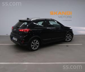 Black Hyundai i20 2018 in Riga, with an engine capacity of 1.00 L and mileage of 141 thousand km for 11900 €, photo 4 on AUTOMOTO.COM.LV