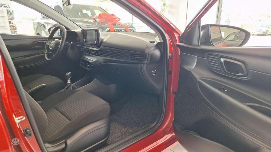 Red Hyundai i20 2022 in Kaunas, with an engine capacity of 1.00 L and mileage of 146 thousand km for 9945 €, photo 10 on AUTOMOTO.COM.LV
