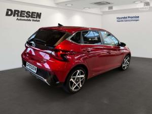 Red Hyundai i20 2024 in Kaunas, with an engine capacity of 1.00 L and mileage of 24 thousand km for 24450 €, photo 3 on AUTOMOTO.COM.LV