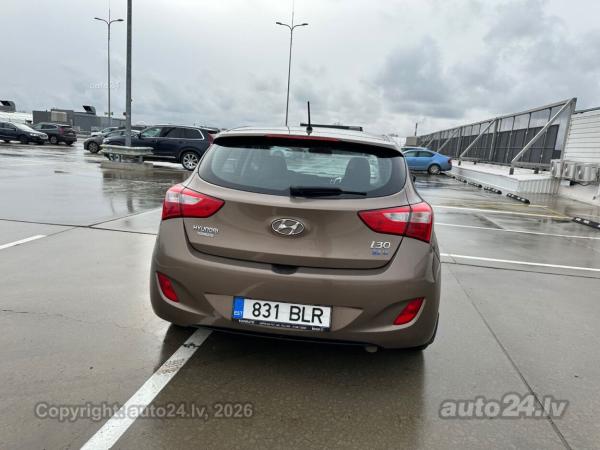 Beige Hyundai i30 2014 in Tallinn, with an engine capacity of 1.60 L and mileage of 133 thousand km for 5850 €, photo 7 on AUTOMOTO.COM.LV