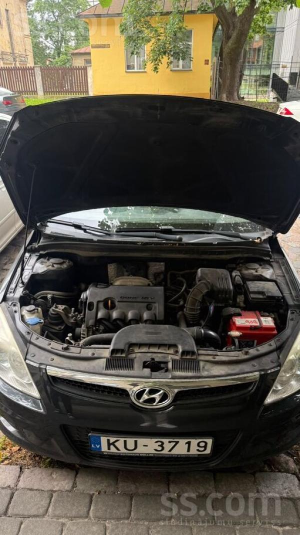 Black Hyundai i30 2008 in Riga, with an engine capacity of 1.40 L and mileage of 240 thousand km for 500 €, photo 9 on AUTOMOTO.COM.LV