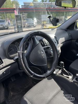 Black Hyundai i30 2009 in Marijampole, with an engine capacity of 1.40 L and mileage of 285 thousand km for 1900 €, photo 7 on AUTOMOTO.COM.LV