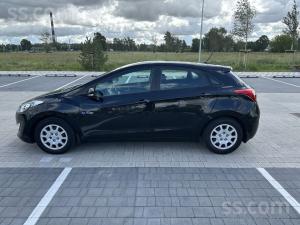 Black Hyundai i30 2013 in Riga, with an engine capacity of 1.40 L and mileage of 188 thousand km for 3390 €, photo 6 on AUTOMOTO.COM.LV
