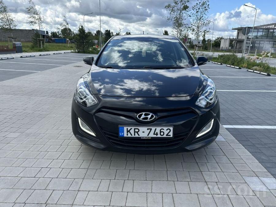 Black Hyundai i30 2013 in Riga, with an engine capacity of 1.40 L and mileage of 188 thousand km for 3390 €, photo 8 on AUTOMOTO.COM.LV