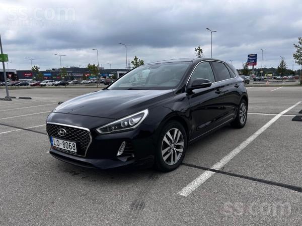 Black Hyundai i30 2018 in Riga, with an engine capacity of 1.60 L and mileage of 129 thousand km for 9900 €, photo 2 on AUTOMOTO.COM.LV