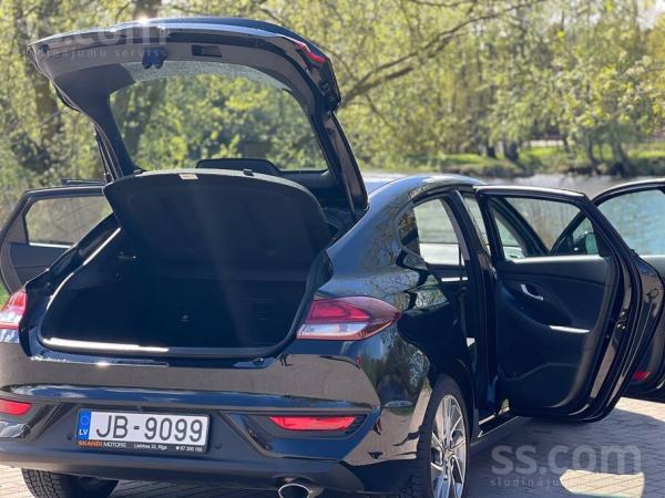 Black Hyundai i30 2018 in Riga, with an engine capacity of 1.40 L and mileage of 56 thousand km for 12900 €, photo 8 on AUTOMOTO.COM.LV