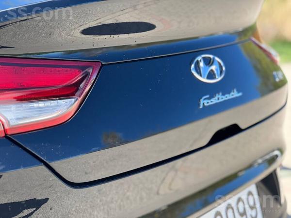 Black Hyundai i30 2018 in Riga, with an engine capacity of 1.40 L and mileage of 56 thousand km for 12900 €, photo 10 on AUTOMOTO.COM.LV