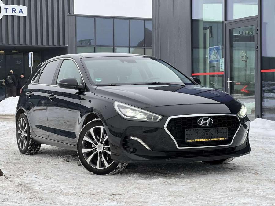 Black Hyundai i30 2019 in Siauliai, with an engine capacity of 1.58 L and mileage of 202 thousand km for 9900 €, photo 1 on AUTOMOTO.COM.LV