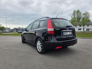 Black Hyundai i30 2012 in Panevezys, with an engine capacity of 1.60 L and mileage of 250 thousand km for 2800 €, photo 3 on AUTOMOTO.COM.LV