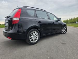 Black Hyundai i30 2012 in Panevezys, with an engine capacity of 1.60 L and mileage of 250 thousand km for 2800 €, photo 4 on AUTOMOTO.COM.LV