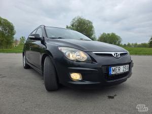 Black Hyundai i30 2012 in Panevezys, with an engine capacity of 1.60 L and mileage of 250 thousand km for 2800 €, photo 6 on AUTOMOTO.COM.LV