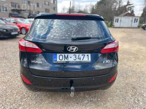 Black Hyundai i30 2012 in Kuldiga, with an engine capacity of 1.60 L and mileage of 284 thousand km for 4690 €, photo 8 on AUTOMOTO.COM.LV
