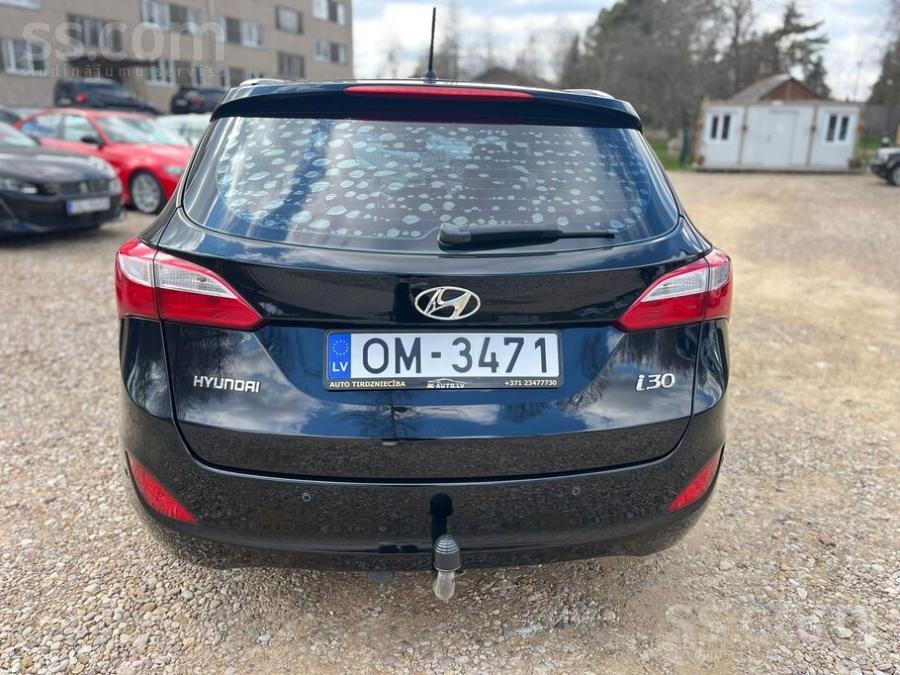 Black Hyundai i30 2012 in Kuldiga, with an engine capacity of 1.60 L and mileage of 284 thousand km for 4690 €, photo 8 on AUTOMOTO.COM.LV