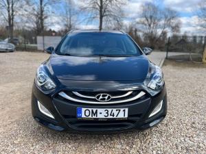 Black Hyundai i30 2012 in Kuldiga, with an engine capacity of 1.60 L and mileage of 284 thousand km for 4690 €, photo 9 on AUTOMOTO.COM.LV