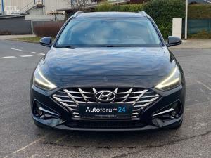 Black Hyundai i30 2023 in Kaunas, with an engine capacity of 1.00 L and mileage of 46 thousand km for 22745 €, photo 8 on AUTOMOTO.COM.LV