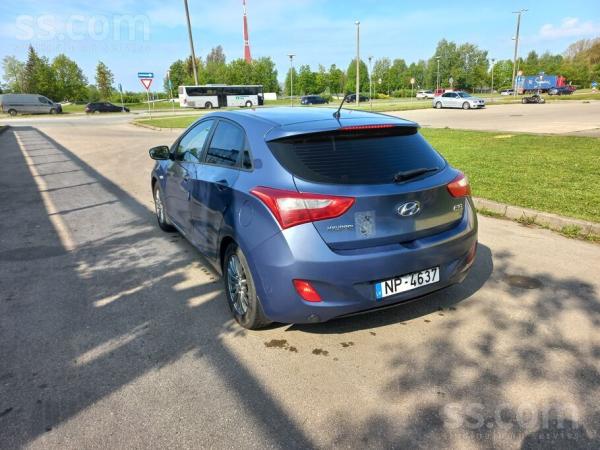 Blue Hyundai i30 2013 in Riga, with an engine capacity of 1.40 L and mileage of 128 thousand km for 4700 €, photo 2 on AUTOMOTO.COM.LV