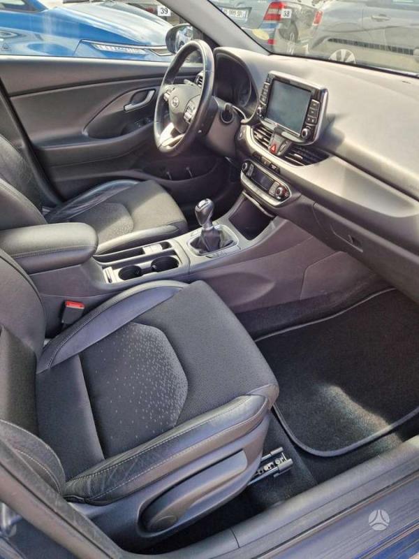 Zils Hyundai i30 2018 Tauragė, ar dzinēja tilpumu 1.58 L un nobraukumu 240 tūkst. km par 6400 €, foto 8 vietnē AUTOMOTO.COM.LV