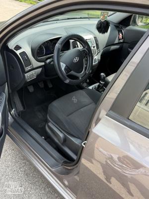 Brown Hyundai i30 2011 in Alytus, with an engine capacity of 1.40 L and mileage of 171 thousand km for 3000 €, photo 7 on AUTOMOTO.COM.LV