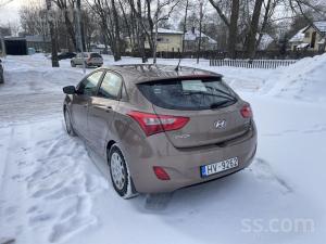 Brown Hyundai i30 2012 in Riga, with an engine capacity of 1.40 L and mileage of 230 thousand km for 3500 €, photo 3 on AUTOMOTO.COM.LV