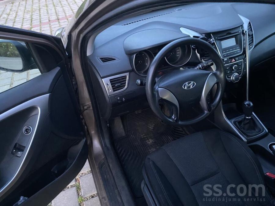 Brown Hyundai i30 2012 in Riga, with an engine capacity of 1.40 L and mileage of 208 thousand km for 3000 €, photo 7 on AUTOMOTO.COM.LV