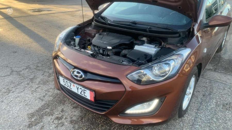 Brown Hyundai i30 2013 in Marijampole, with an engine capacity of 1.59 L and mileage of 200 thousand km for 4300 €, photo 19 on AUTOMOTO.COM.LV