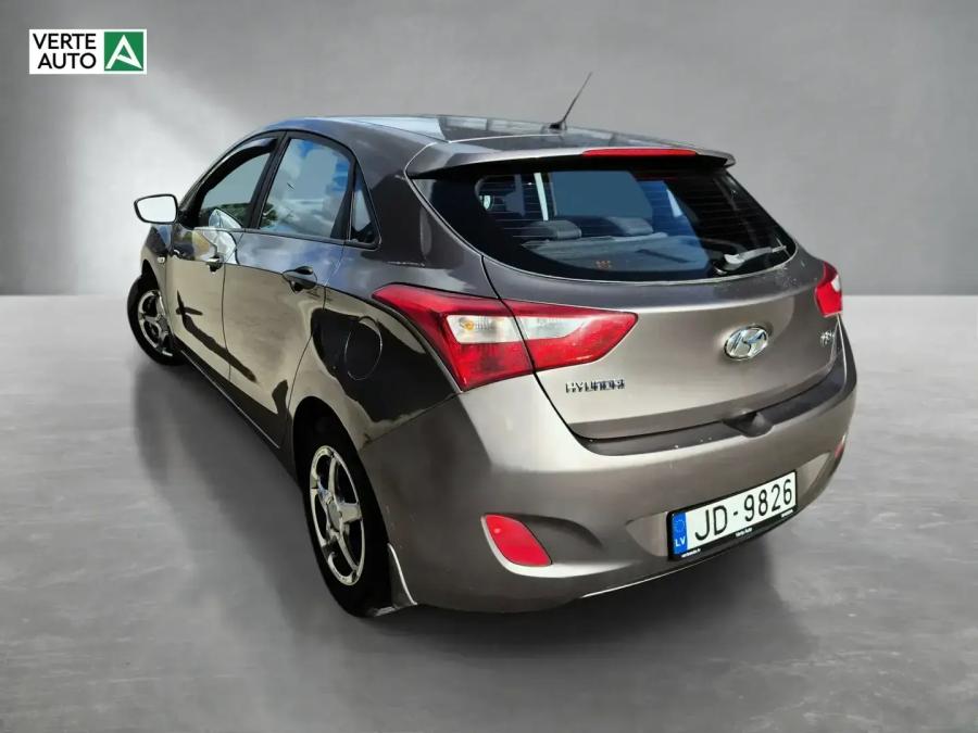 Brown Hyundai i30 2013 in Riga, with an engine capacity of 1.40 L and mileage of 130 thousand km for 3490 €, photo 5 on AUTOMOTO.COM.LV