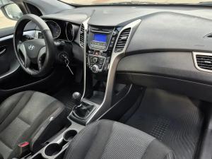 Brown Hyundai i30 2013 in Riga, with an engine capacity of 1.40 L and mileage of 130 thousand km for 3490 €, photo 6 on AUTOMOTO.COM.LV