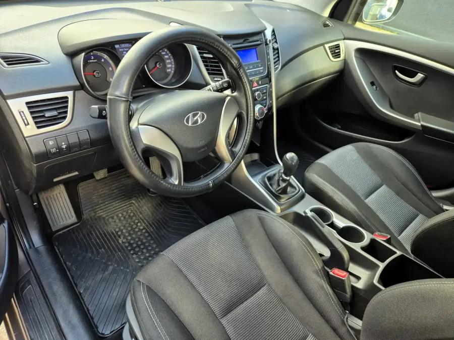 Brown Hyundai i30 2013 in Riga, with an engine capacity of 1.40 L and mileage of 130 thousand km for 3490 €, photo 7 on AUTOMOTO.COM.LV