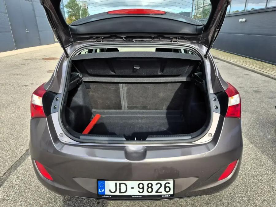 Brown Hyundai i30 2013 in Riga, with an engine capacity of 1.40 L and mileage of 130 thousand km for 3490 €, photo 10 on AUTOMOTO.COM.LV