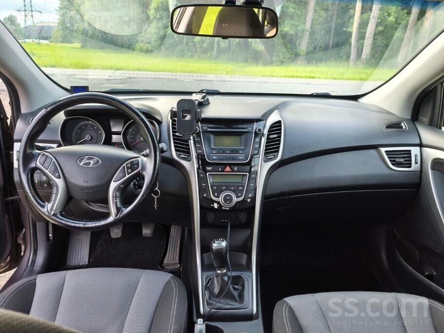 Brown Hyundai i30 2014 in Riga, with an engine capacity of 1.60 L and mileage of 102 thousand km for 5500 €, photo 6 on AUTOMOTO.COM.LV