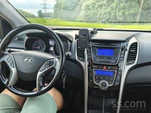 Brown Hyundai i30 2014 in Riga, with an engine capacity of 1.60 L and mileage of 102 thousand km for 5500 €, photo 9 on AUTOMOTO.COM.LV